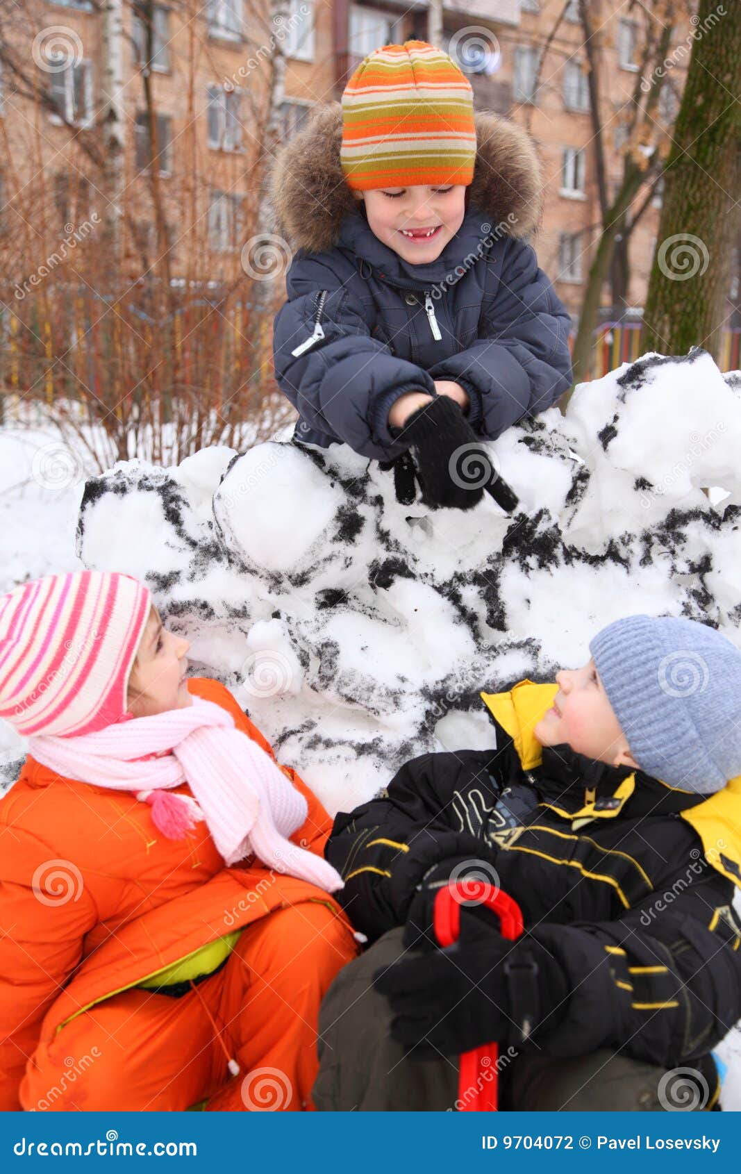 Three Children at Snow Fortress in Yard Stock Photo - Image of people ...