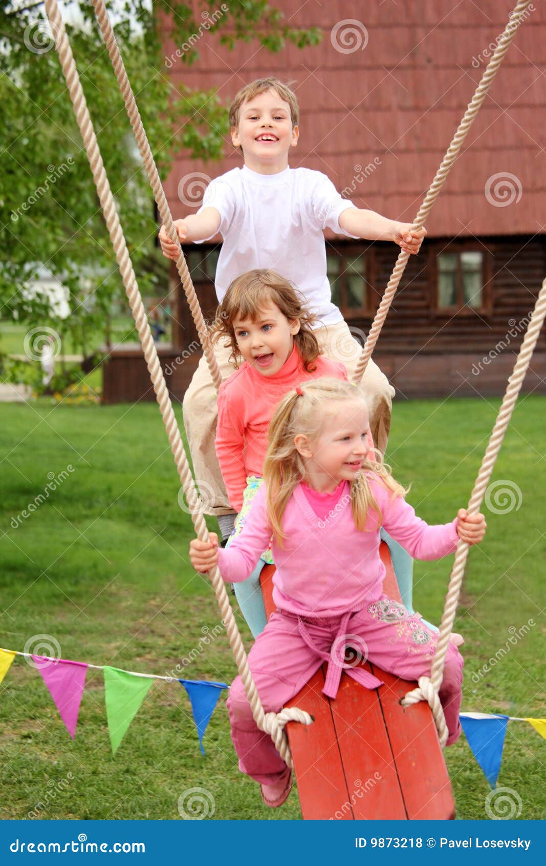 Three children on swing stock photo. Image of board, child - 9873218