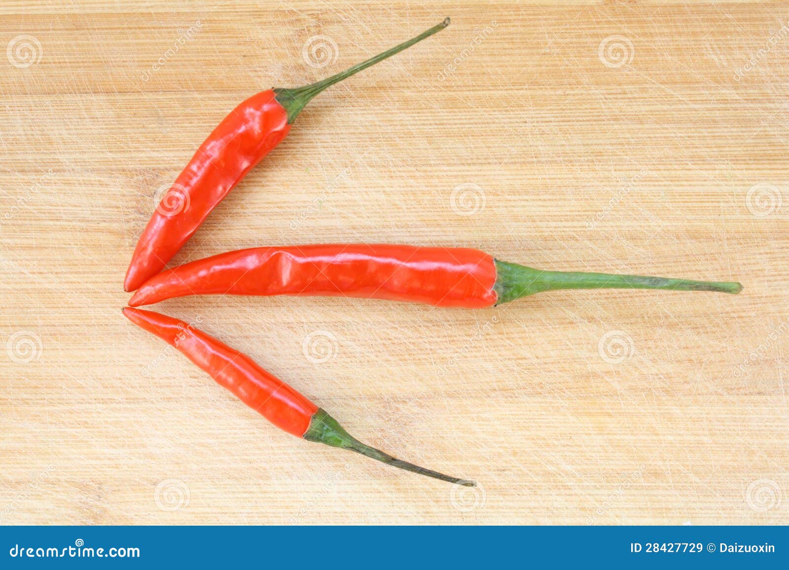 Three Chili Peppers on Wood Stock Image - Image of table, studio: 28427729