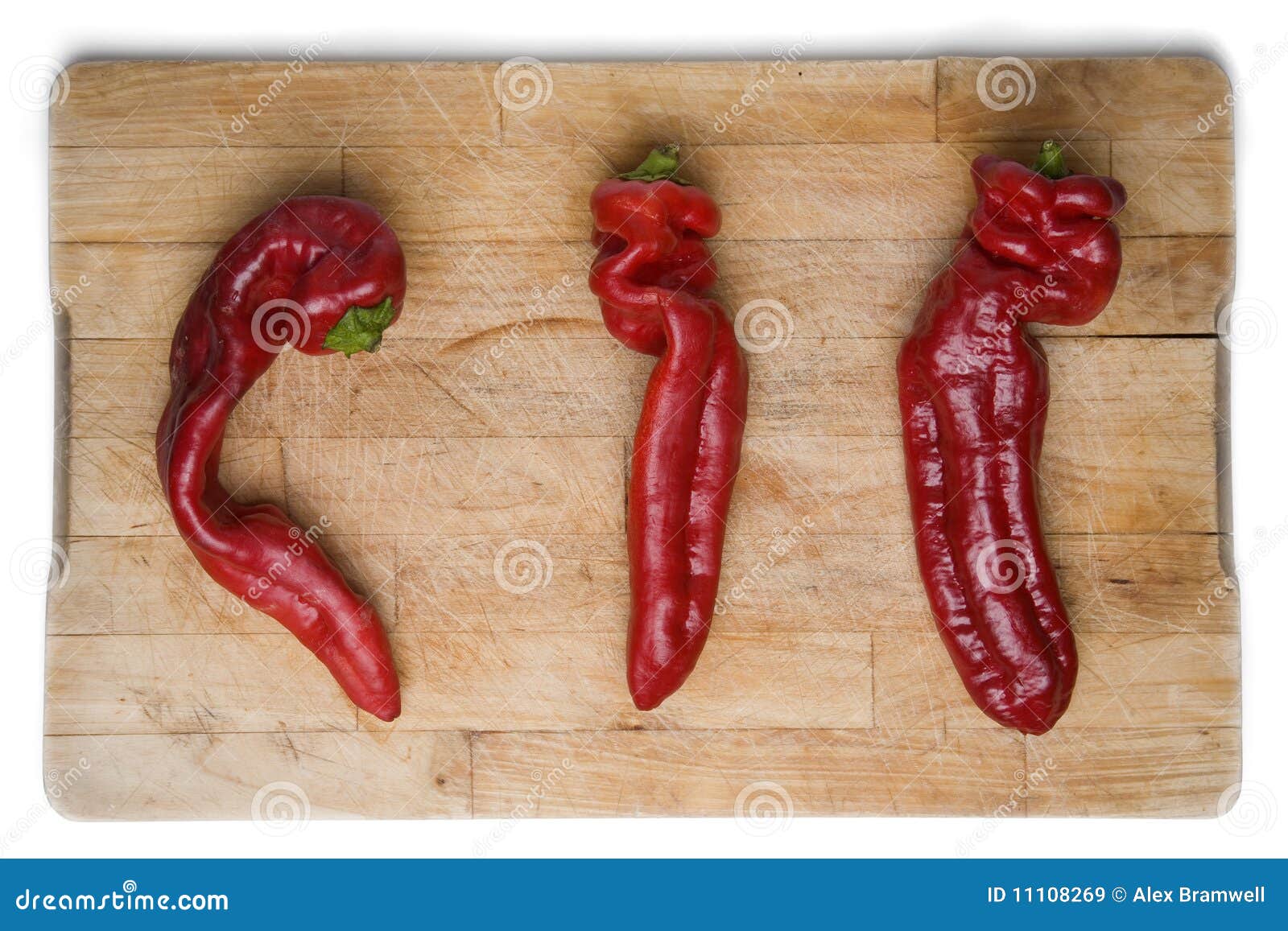 Three Chilis stock image. Image of spice, heallthy, wooden - 11108269