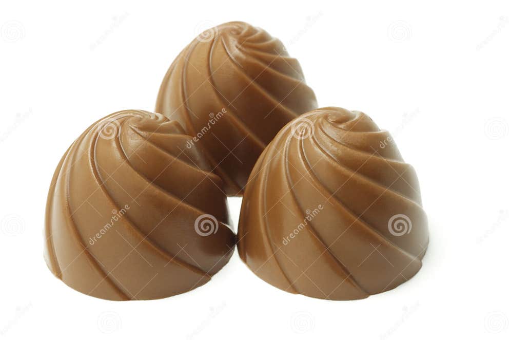 Three chocolate candies stock photo. Image of truffles - 15612948