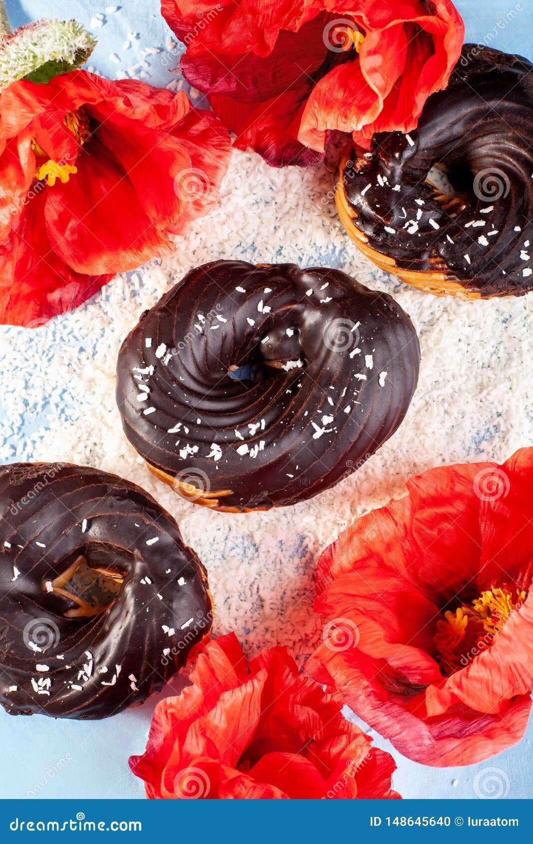 Three Chocolate Donuts with Poppy Flowers Stock Photo - Image of poppy ...
