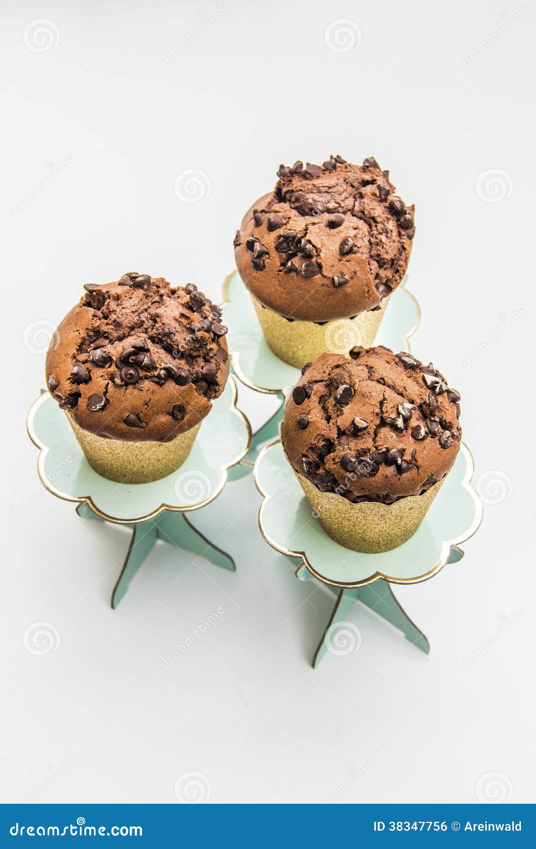 Three Chocolate Muffins stock photo. Image of homemade - 38347756