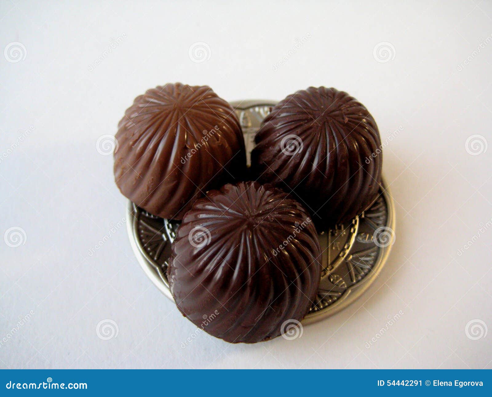 Three chocolates stock image. Image of chocolates, flavor - 54442291