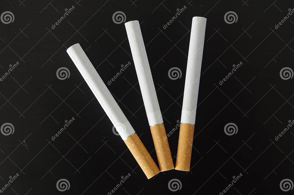 Three cigarettes stock image. Image of filter, cigarettes - 12785457