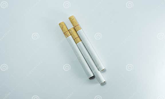Three Cigarettes Isolated on White Stock Photo - Image of three, wood ...