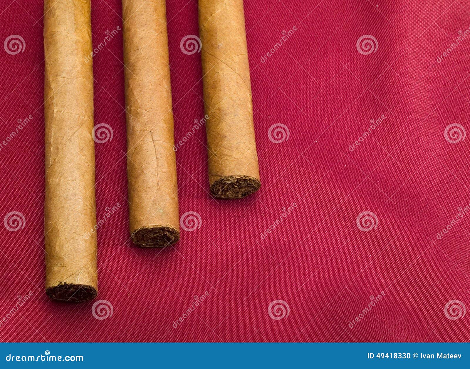 Three Cigars on red satin stock photo. Image of cuban - 49418330