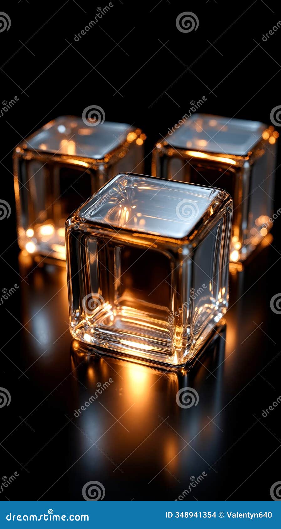 Three Clear Glass Cubes Sitting on Top of a Table Stock Photo - Image ...