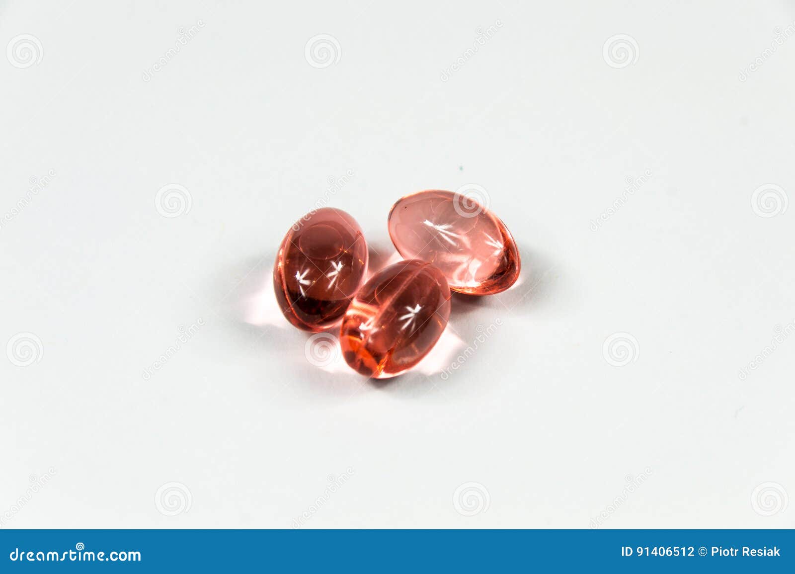 Three Clear Red Soft Gelatine Capsules. Stock Photo - Image of clear ...