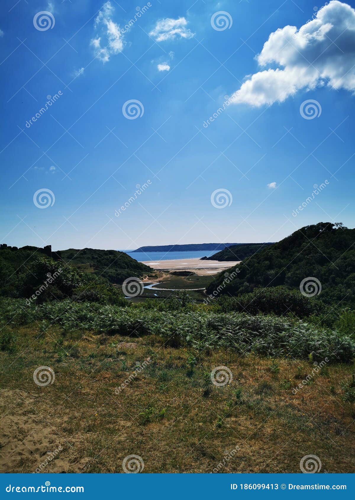 Three Cliffs Beach stock image. Image of clouds, nature - 186099413
