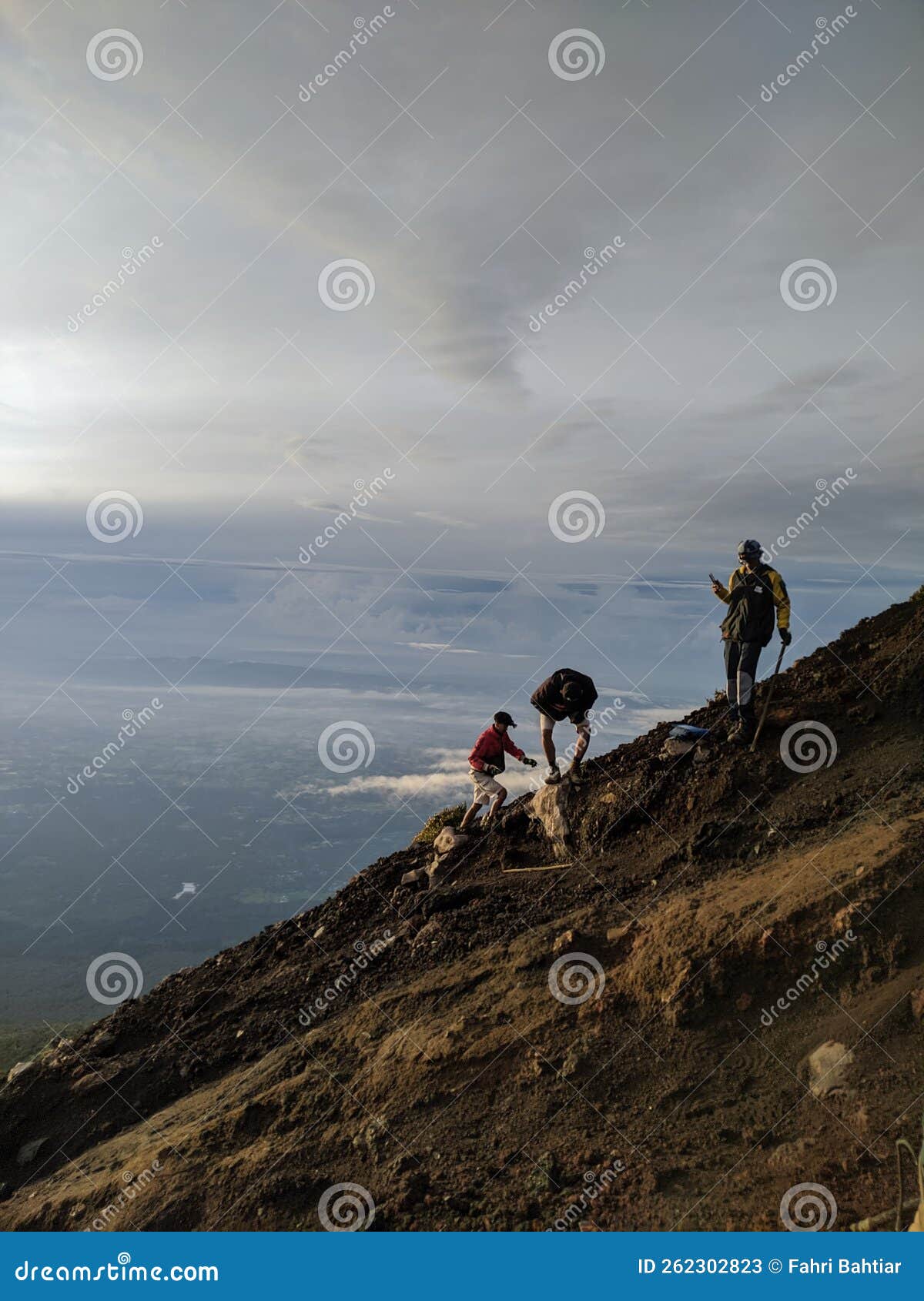Three Climbers Climbing the Top of the Mountain Stock Image - Image of ...