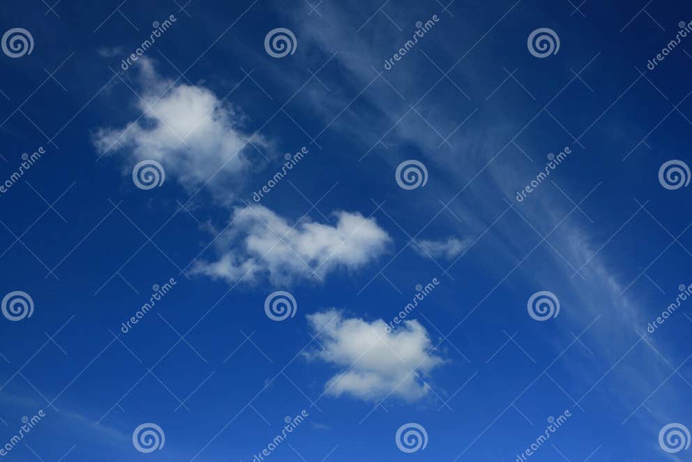 Three clouds stock photo. Image of blue, nature, background - 3239086