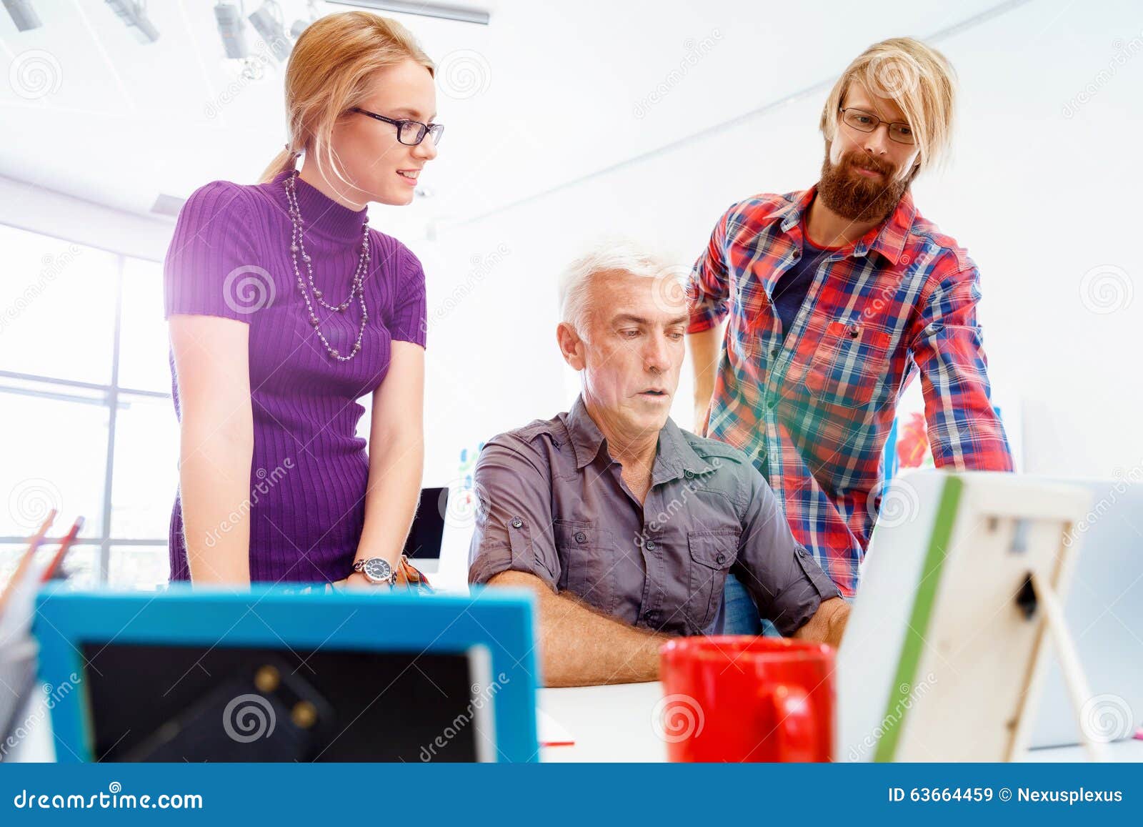 Three Co-workers Working Together Stock Image - Image of persons ...