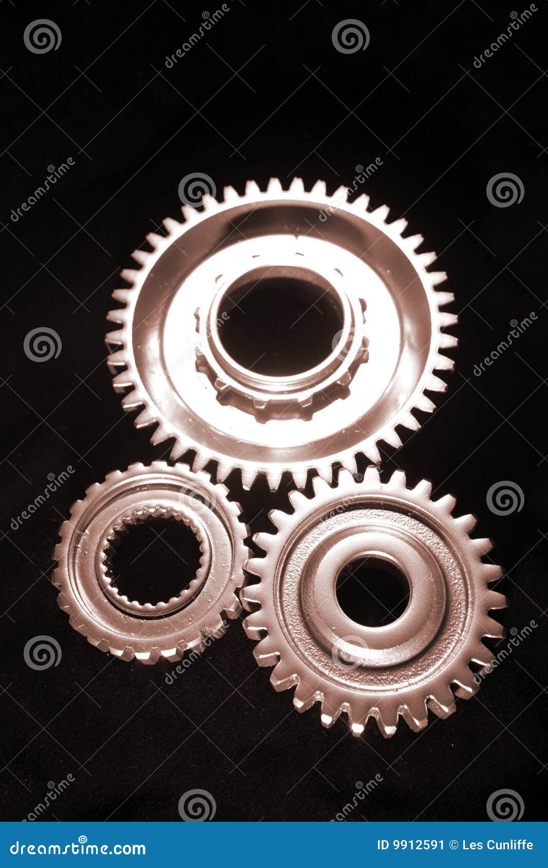Three cogs stock image. Image of engineering, photograph - 9912591