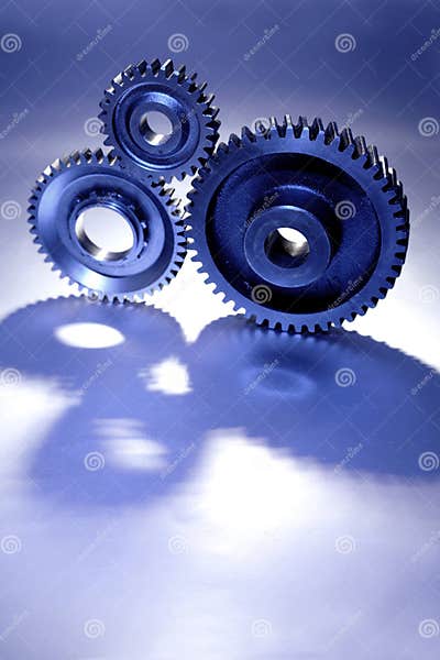 Three cogs together stock image. Image of studio, color - 3587117