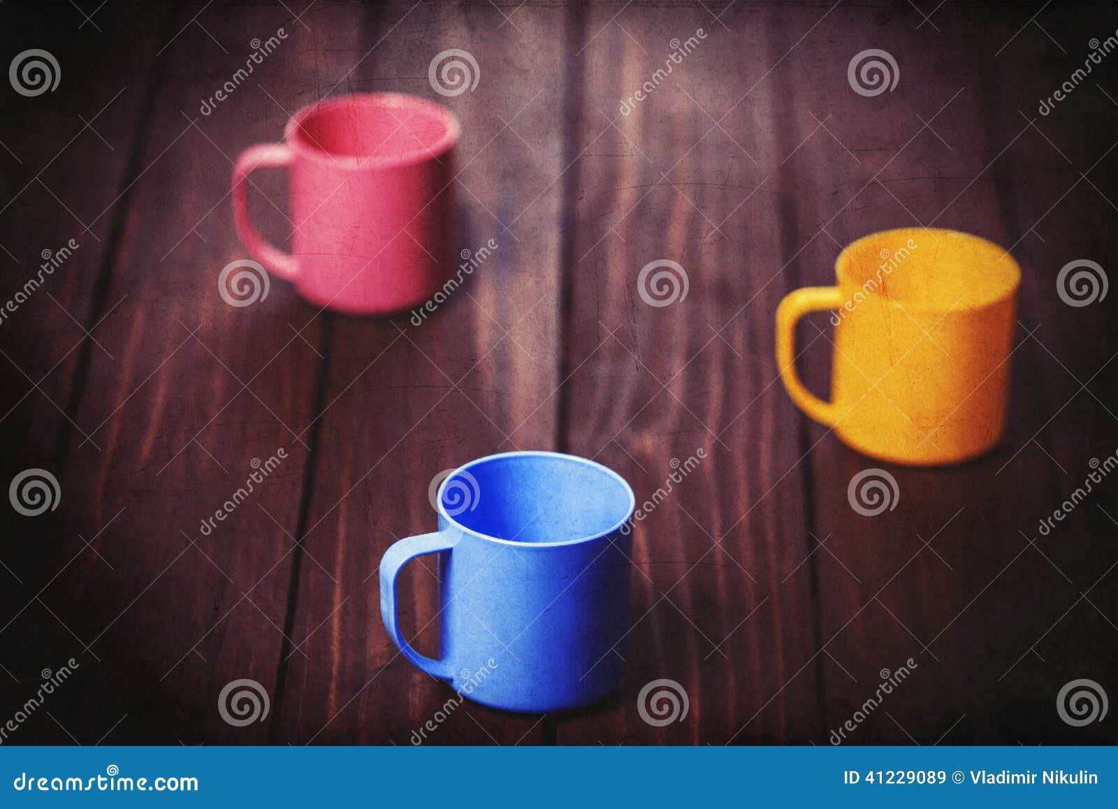 Three Color Cups on Woodent Table. Stock Image - Image of saucer ...