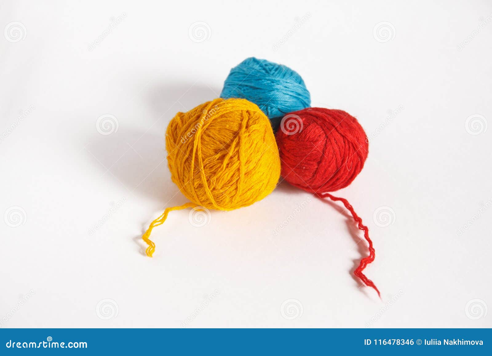 Three Colored Balls of Thread on White Background Stock Photo - Image ...