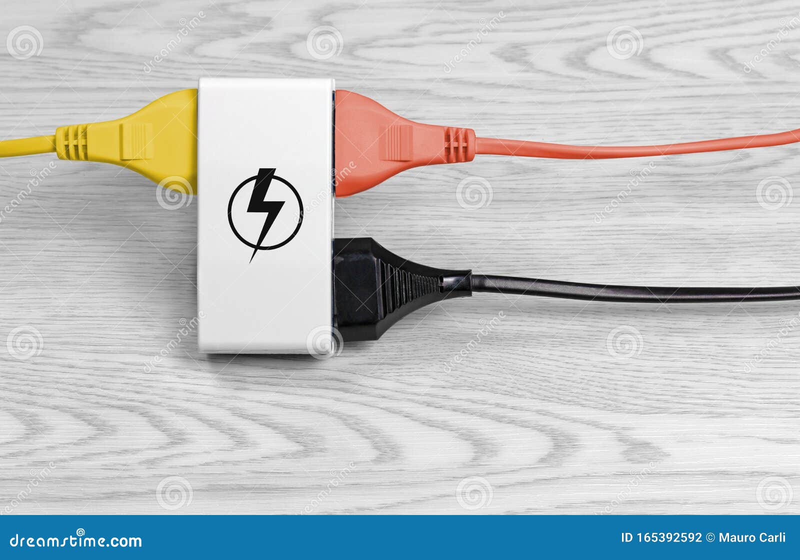 Three Colored Cables Connected To a Multiple Socket Stock Photo - Image ...