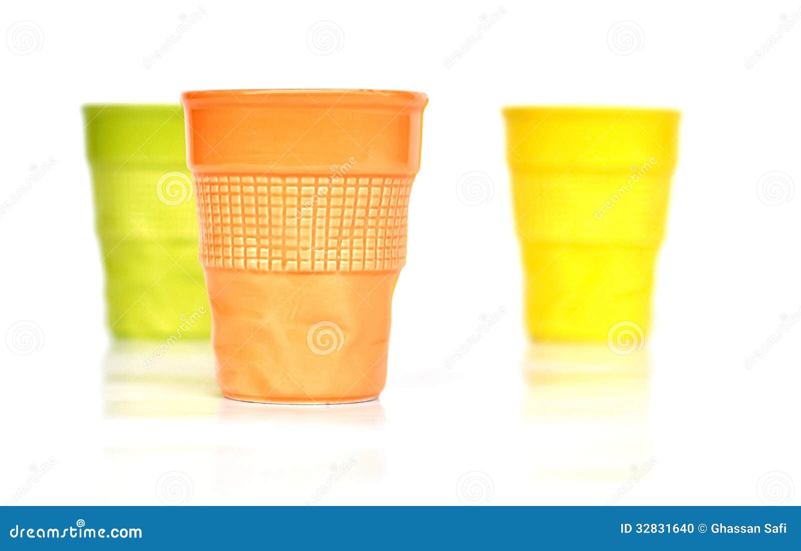 Three colored cups stock photo. Image of colourful, colored - 32831640