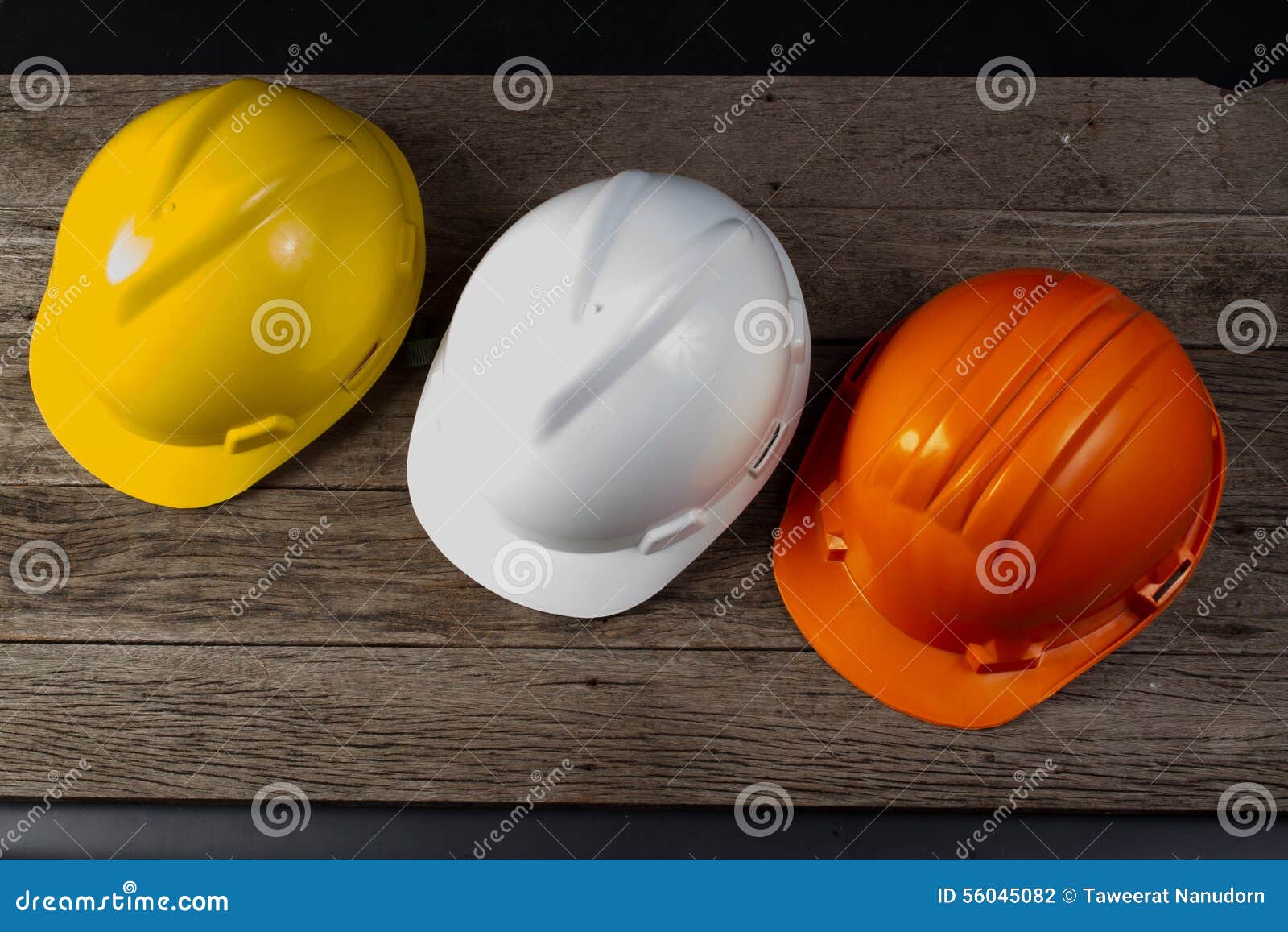 Three Colored Helmet for Engineers Stock Photo - Image of yellow ...