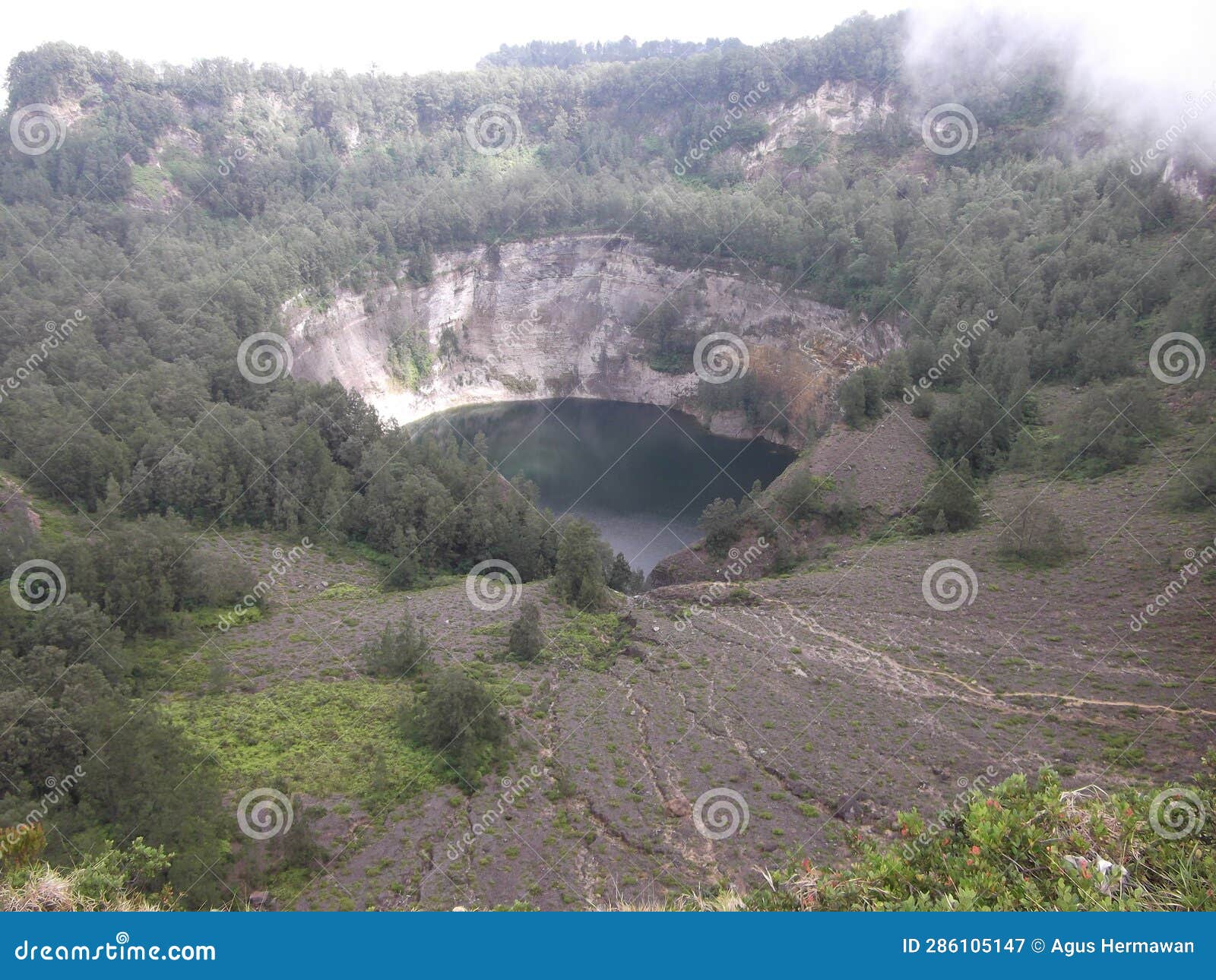 The Three-colored Lake on Mount Kelimutu in the Photo is One of these ...