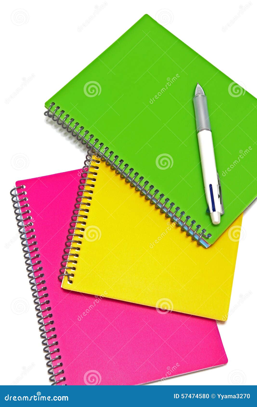 Three Colored Notebooks with a Pen on White Background Stock Photo ...