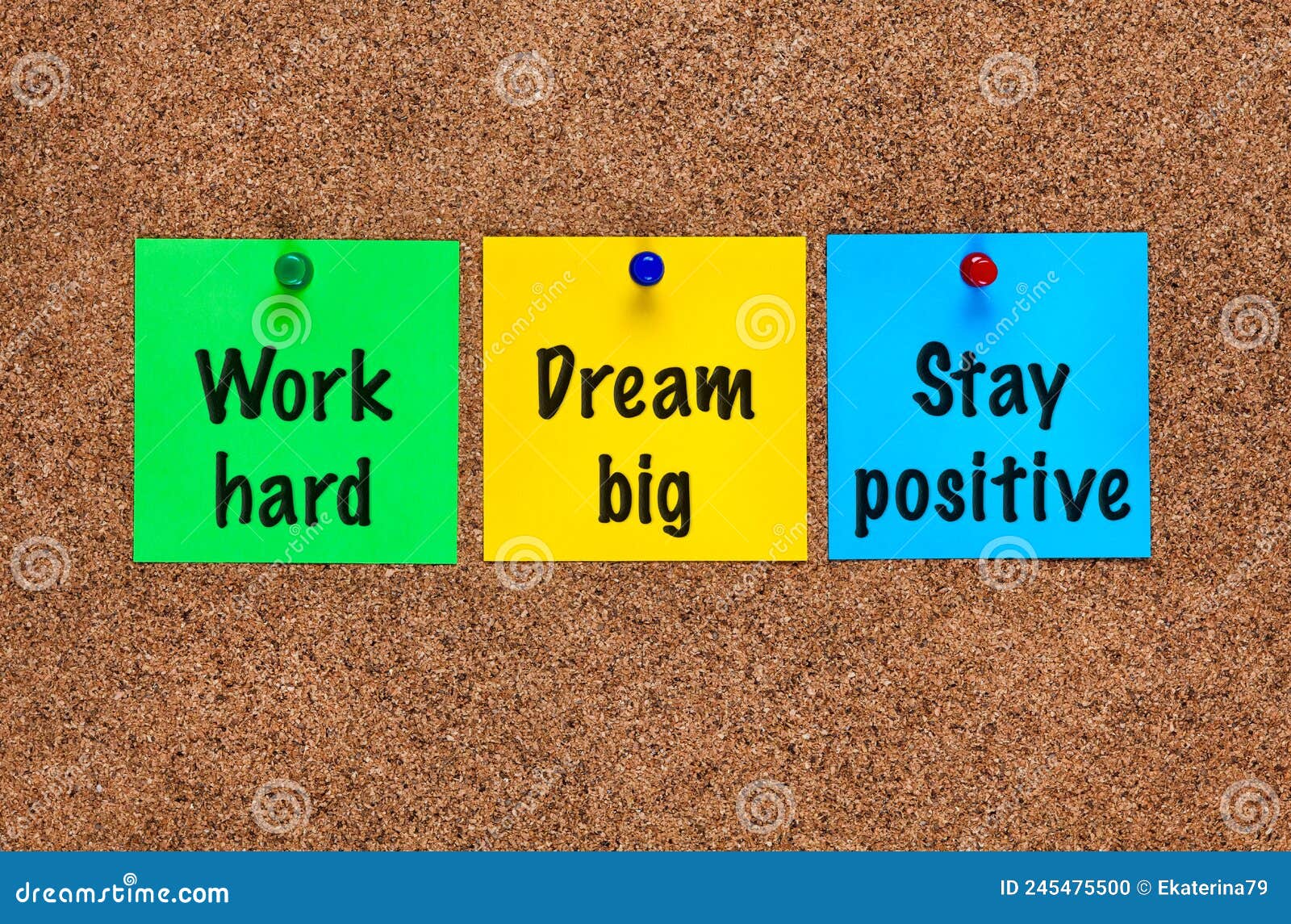 Three Colored Notes on Corkboard with Words Work Hard, Dream Big, Stay ...