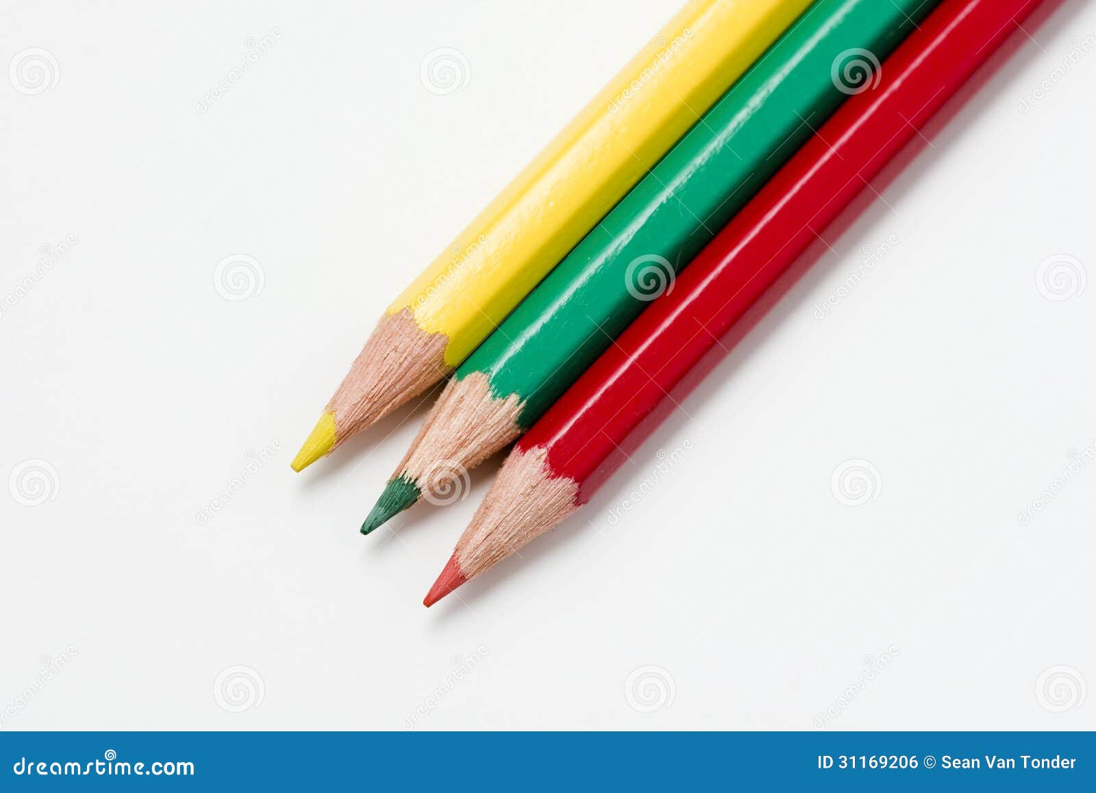 Three colored pencils stock photo. Image of crayon, colors - 31169206