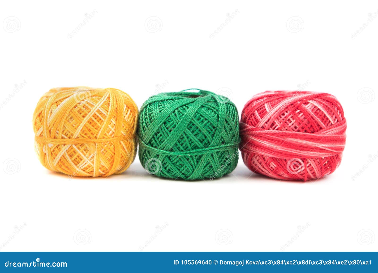 Three Colored Sewing Threads in a Row on a White Background. Blue ...