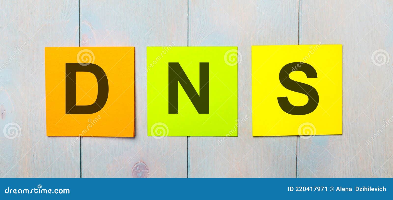 Three Colored Stickers with the Text DNS Domain Name System on a Light ...