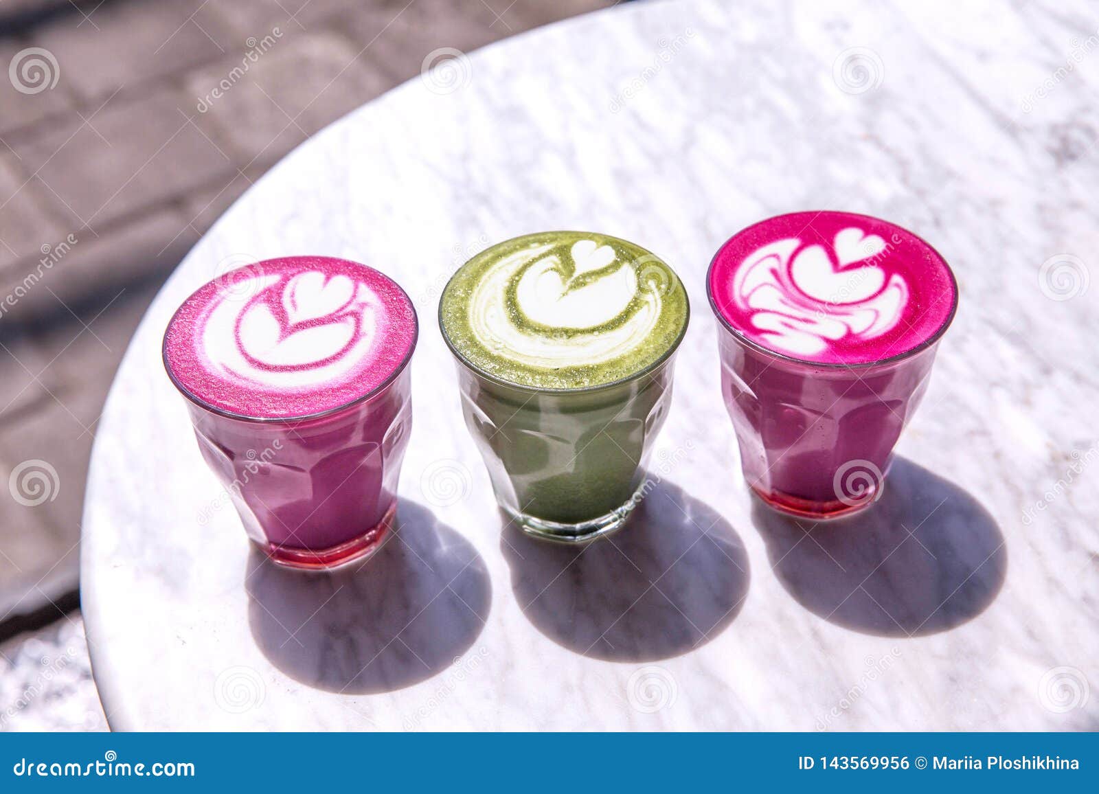 Three Colorful Beetroot, Matcha Lattes on Marble Table Background Stock ...