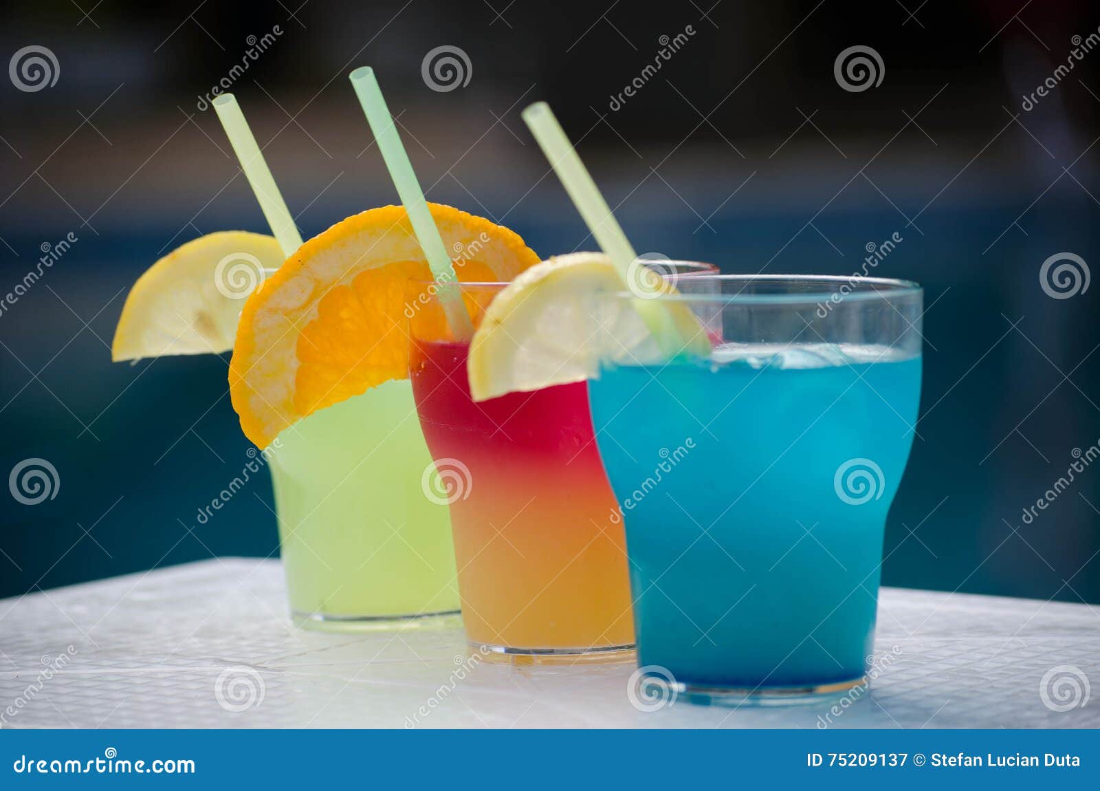 Three Colorful Cocktail Glasses Stock Image - Image of evening, orange ...