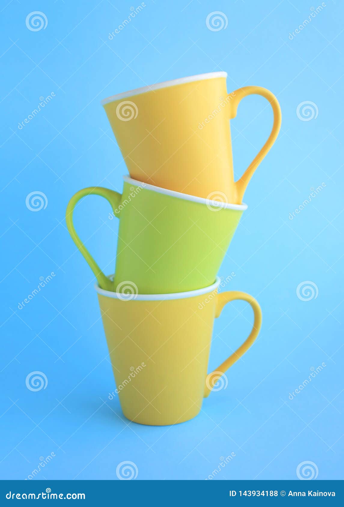 Three Colorful Cups on Blue Stock Photo - Image of domestic, group ...
