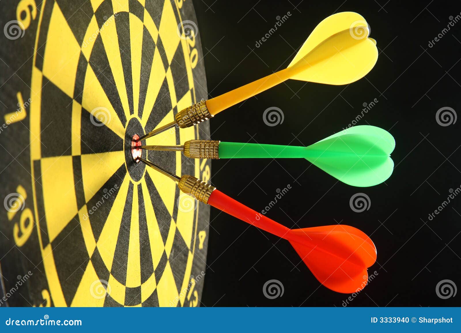 Three colorful darts. stock photo. Image of brass, center - 3333940