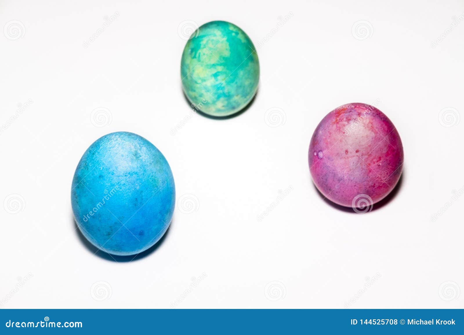Three colorful eggs stock photo. Image of four, eggs - 144525708
