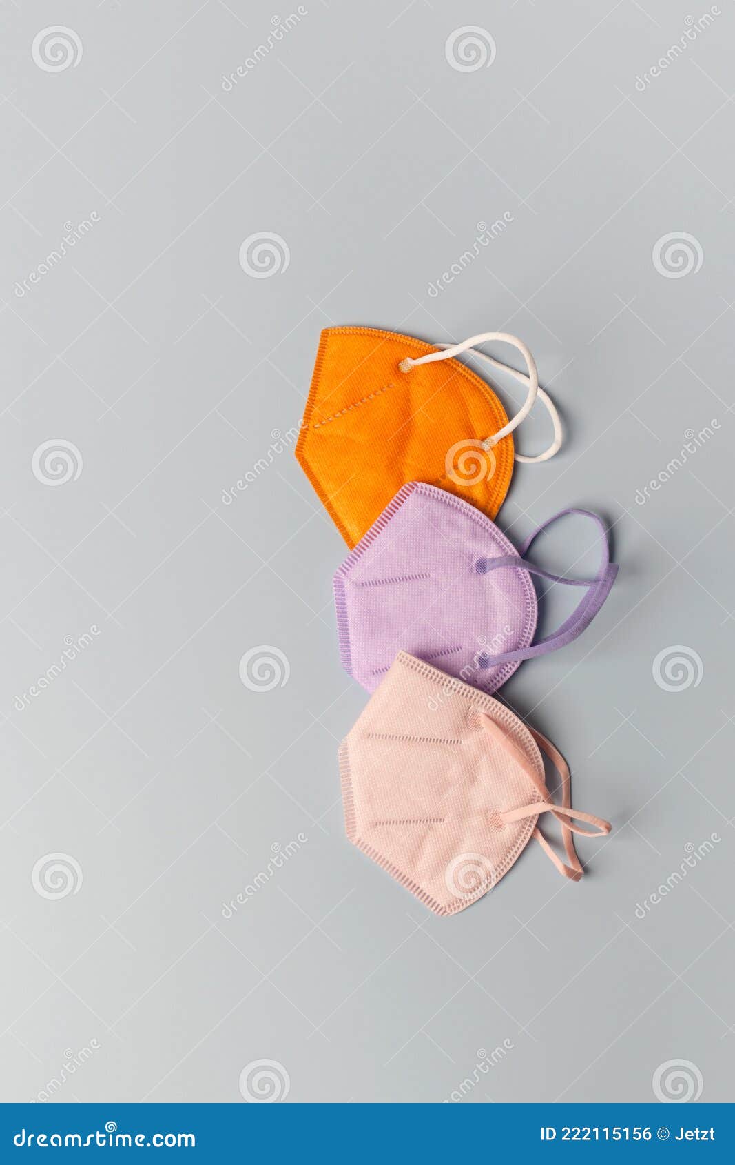 Three Colorful FFP Face Masks on Grey Background, Top View Stock Photo ...