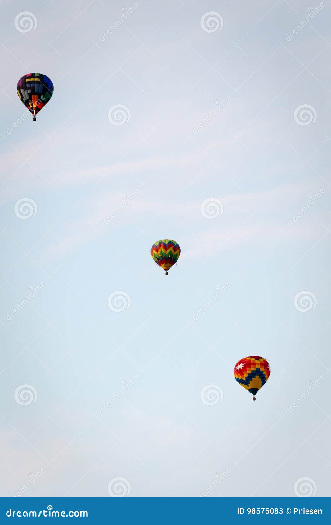 Three Colorful Hot Air Balloons Float in a Row Away into the Sky Stock ...