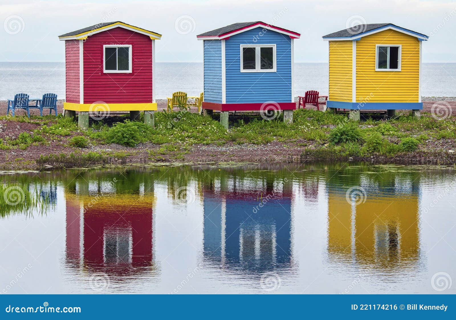 Three colorful huts editorial photo. Image of calm, water - 221174216