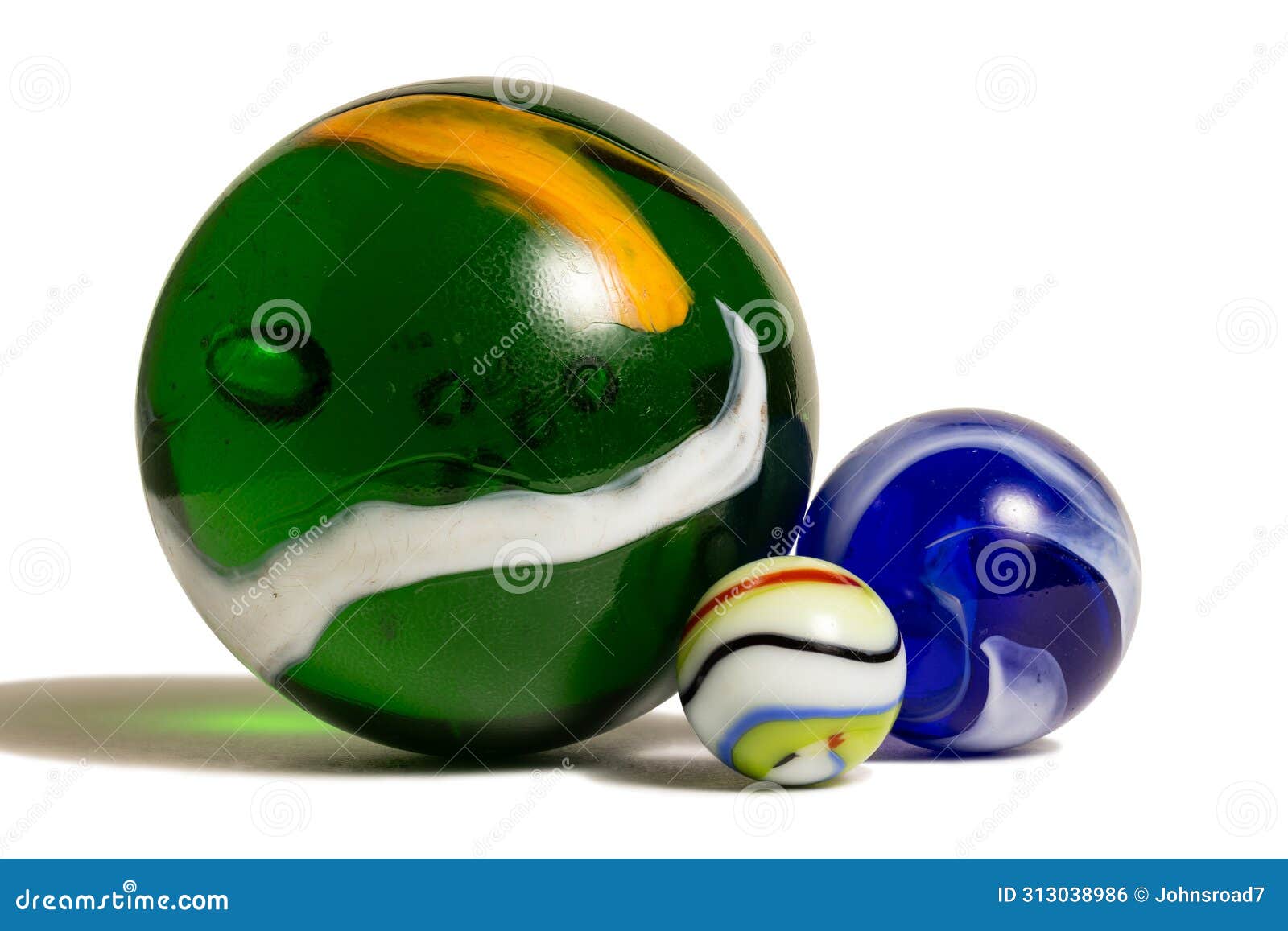 Three Colorful Marbles in Three Sizes Stock Photo - Image of white ...