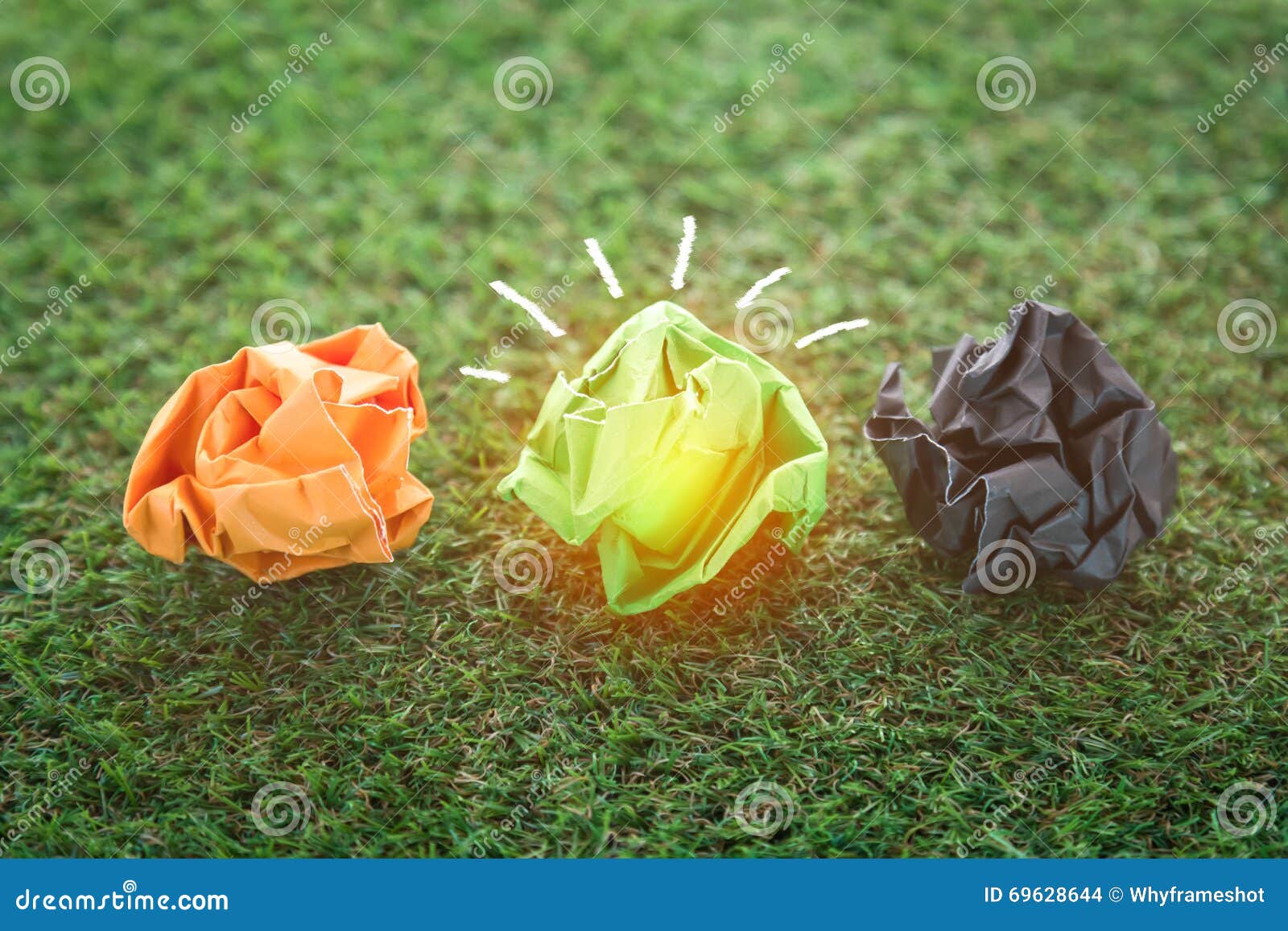 Three Colorful Paper Trash Balls on Green Grass Stock Photo - Image of ...