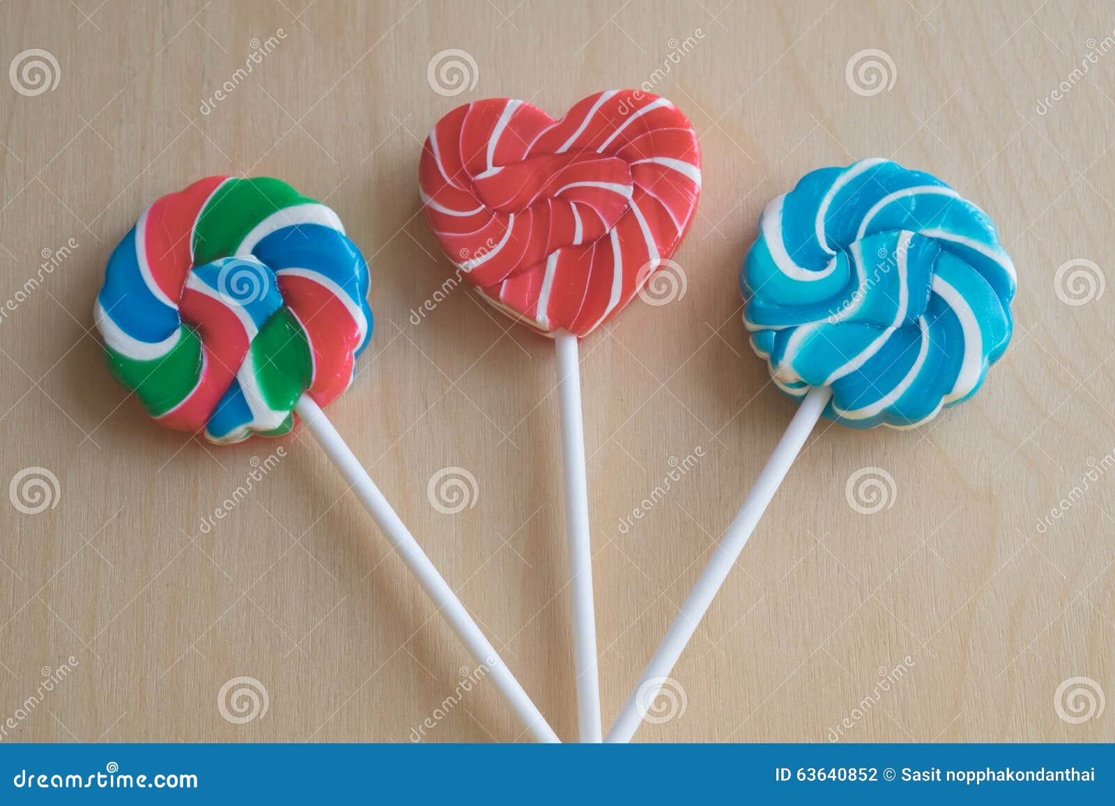 Three Colorful Sugar Lollipops Stock Photo - Image of invitation ...