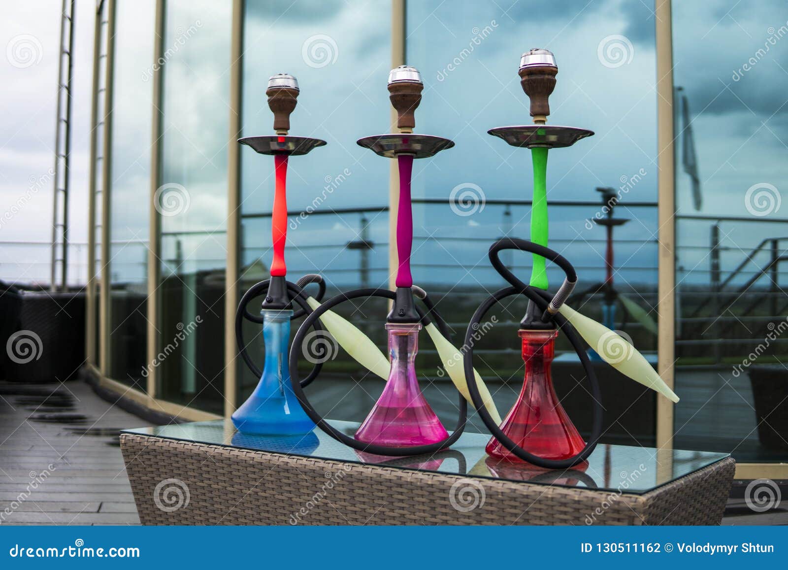 Three Colors Hookahs on Table in Hookah Lounge in a Day. Stock Photo ...
