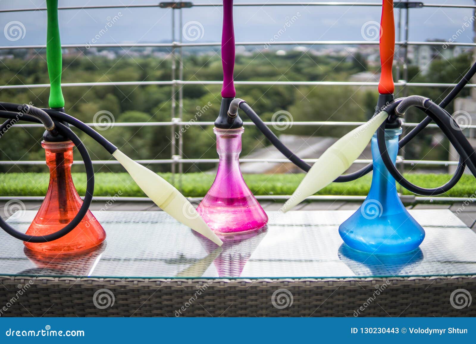 Three Colors Hookahs on Table in Hookah Lounge in a Day. Stock Image ...