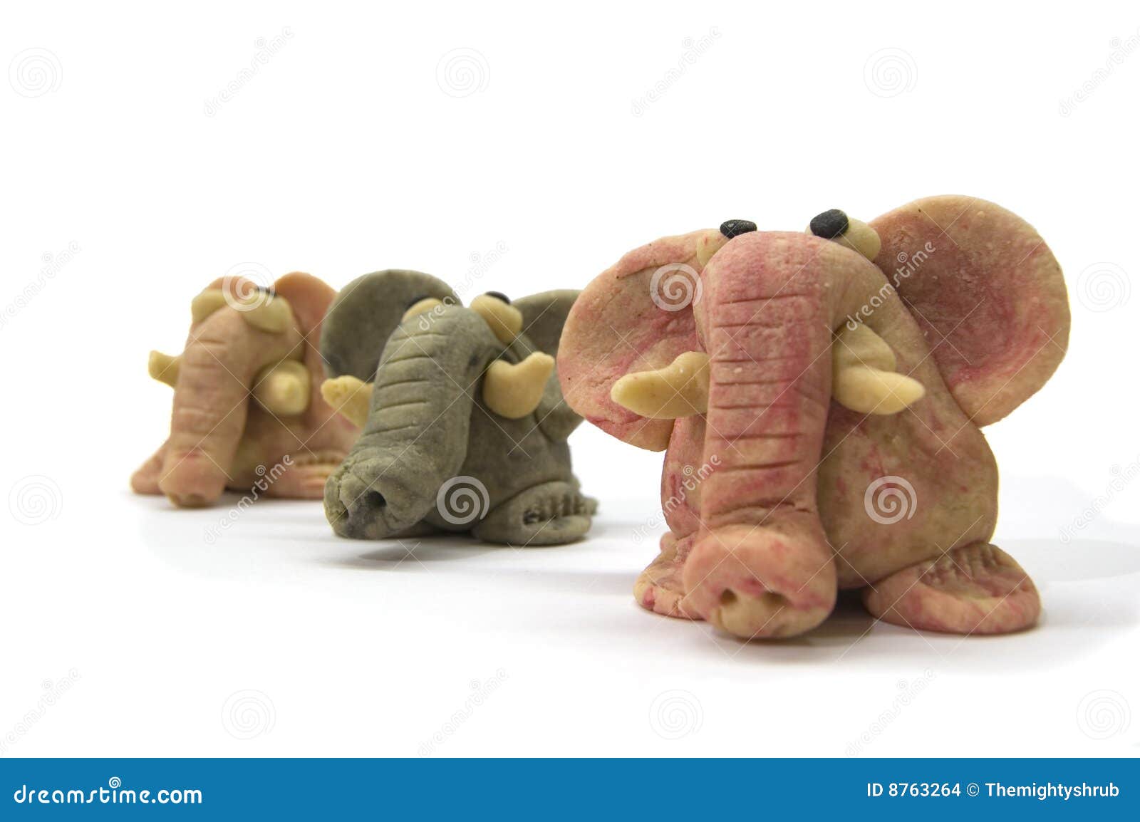 Three Coloured Marzipan Elephants Stock Photo - Image of model ...