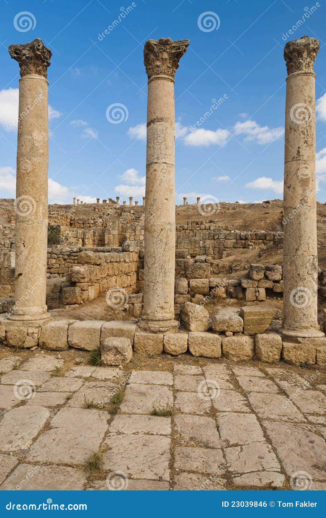 Three Columns Along the Roman Road in Jerash Stock Photo - Image of ...
