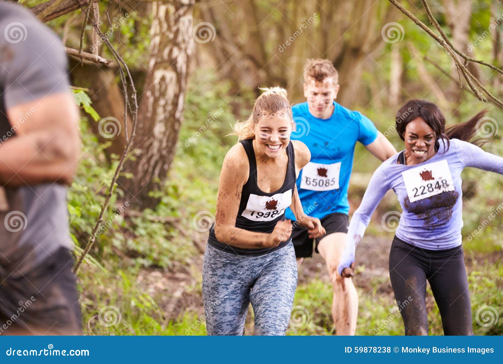 Three Competitors Running in a Forest at an Endurance Event Stock Photo ...