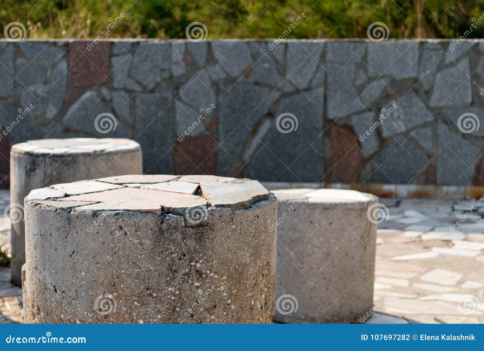Three Concrete Stone Pillars on the Background of Tiles Stock Photo ...