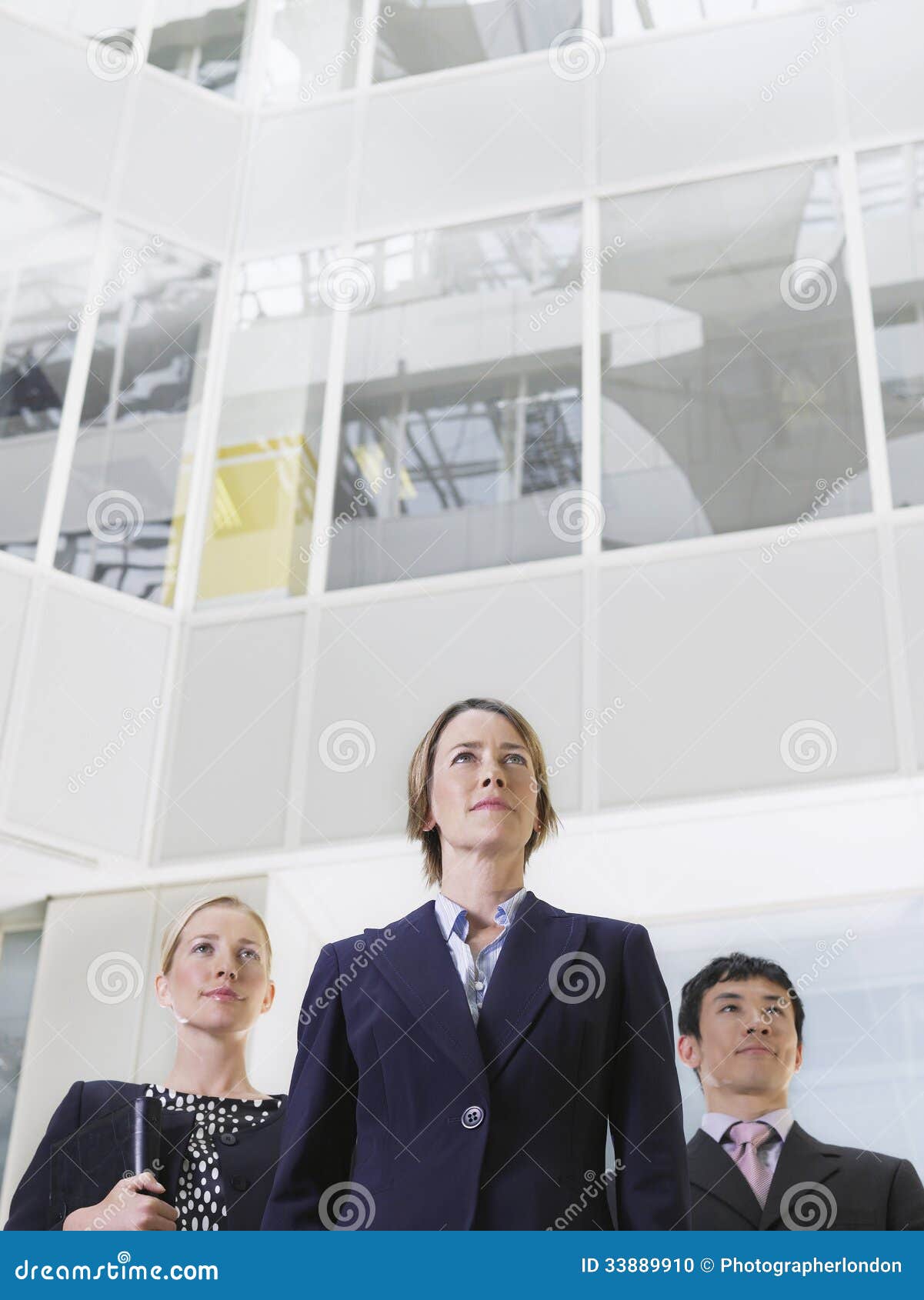 Atrium Of An Office Building With A Large Reception Desk, Granite ...
