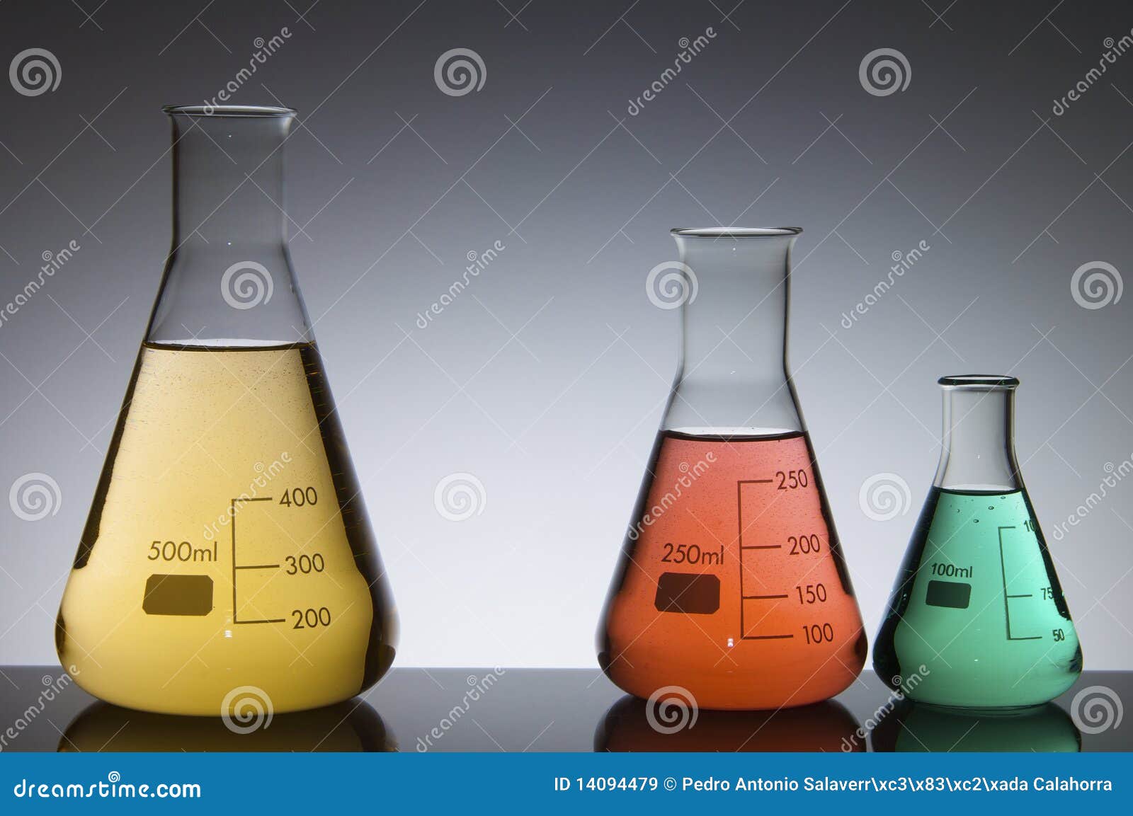 Conical Flasks With Blue Liquid On Background. Laboratory Glassware ... Conical Flasks With Blue Liquid On Background. Laboratory Glassware ...