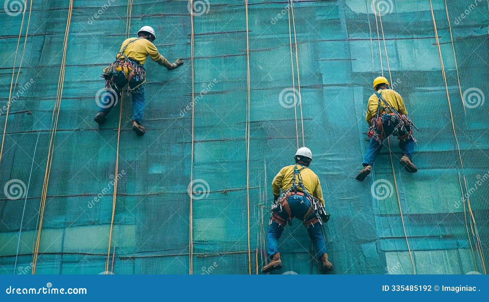 Three Construction Workers Ascending a Building with Safety Gear Stock ...
